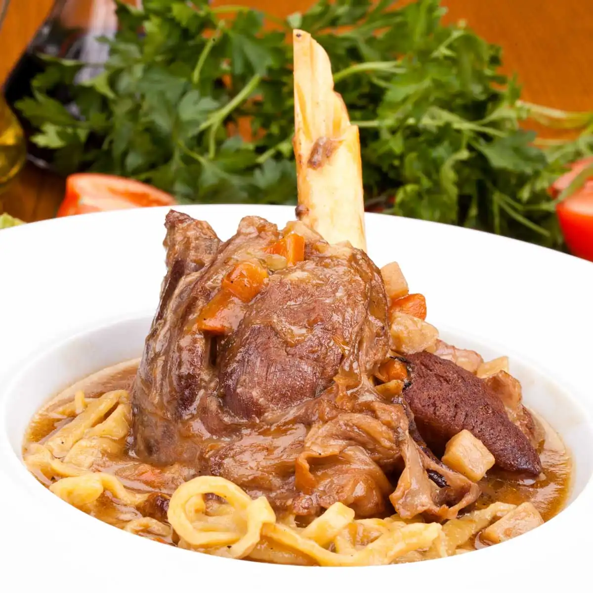 Ossobuco con fetuccini a la crema